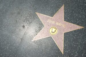 Despite having 7 kids, John Wayne was buried in private & his grave ...